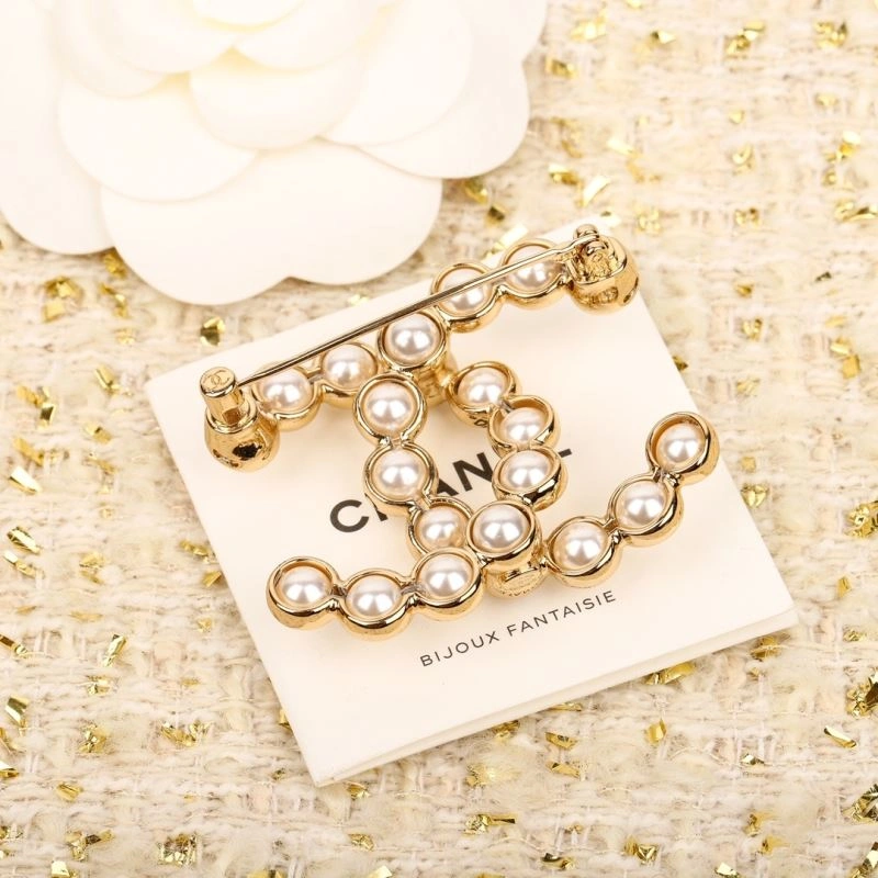 Cut-rate Chanel Brooches
