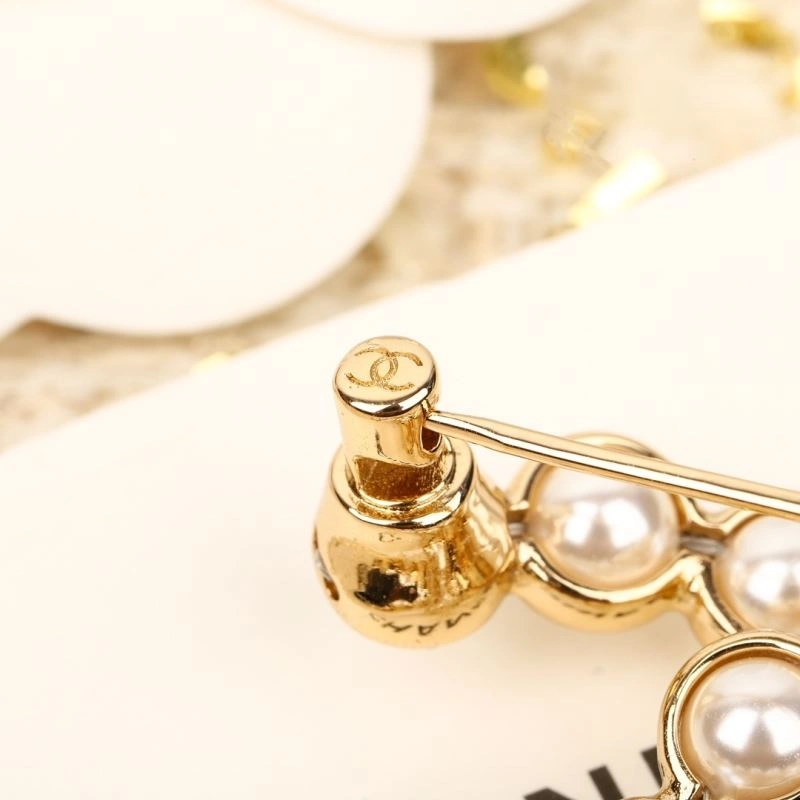 Cut-rate Chanel Brooches