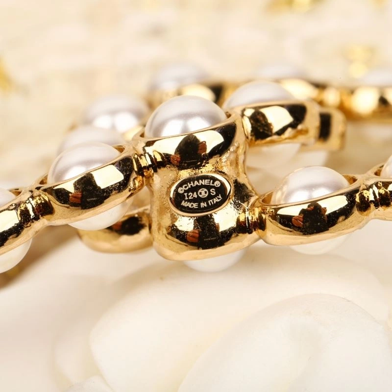 Cut-rate Chanel Brooches