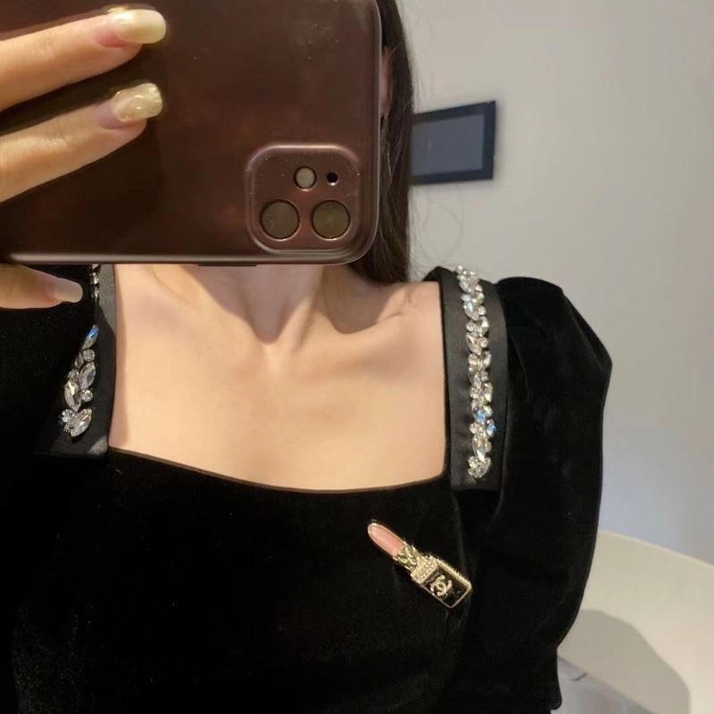 Indistinguishable Chanel Brooches