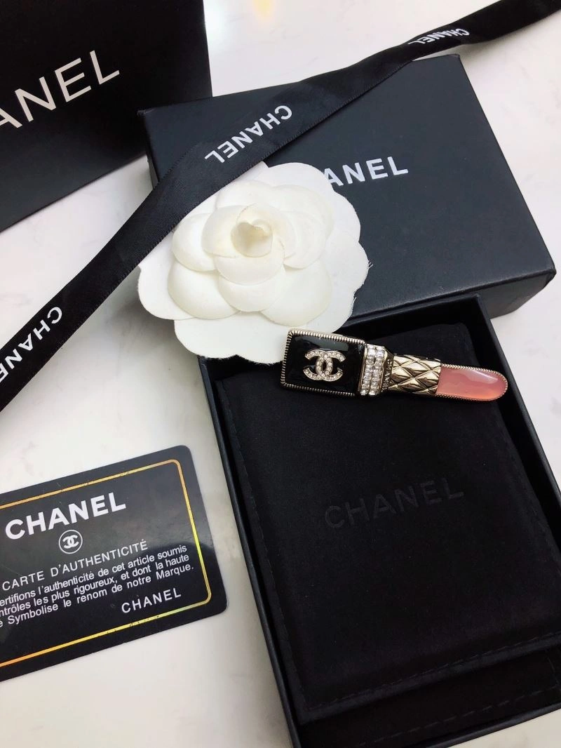 Indistinguishable Chanel Brooches