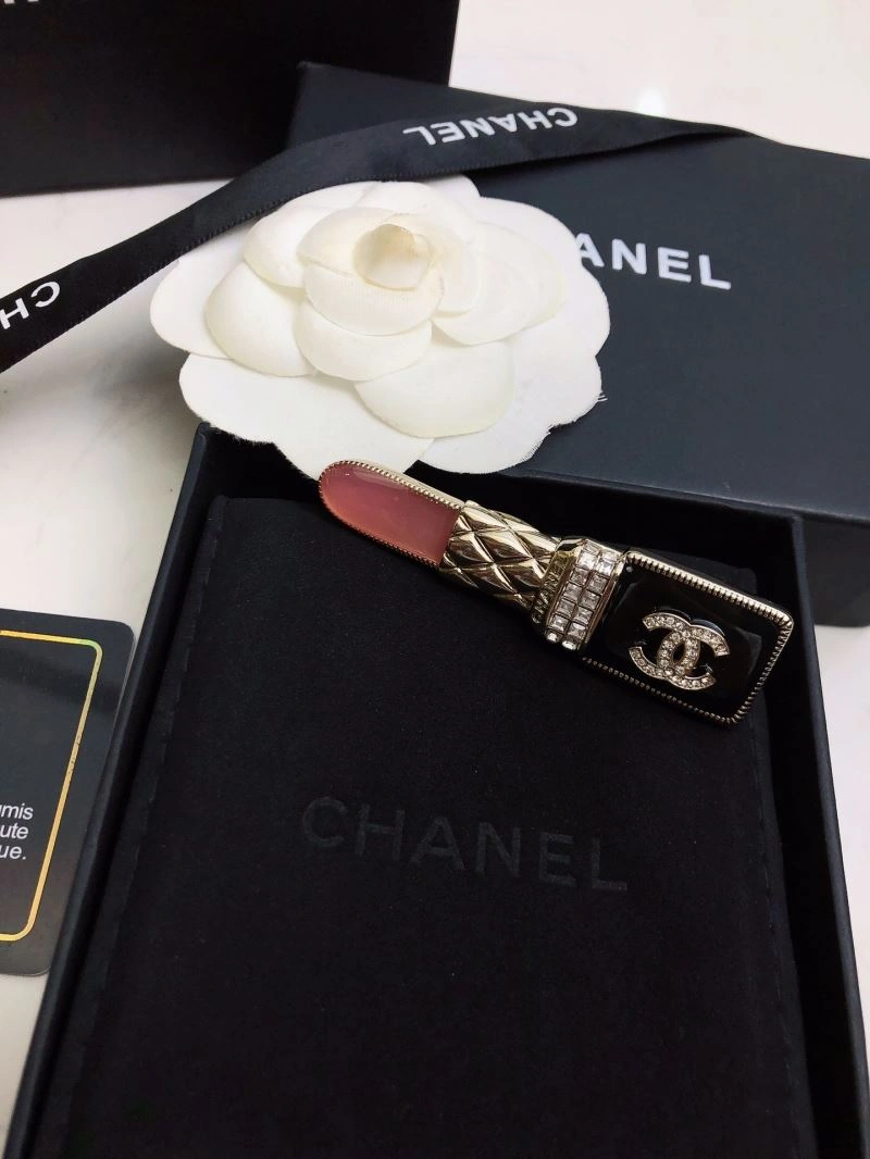 Indistinguishable Chanel Brooches