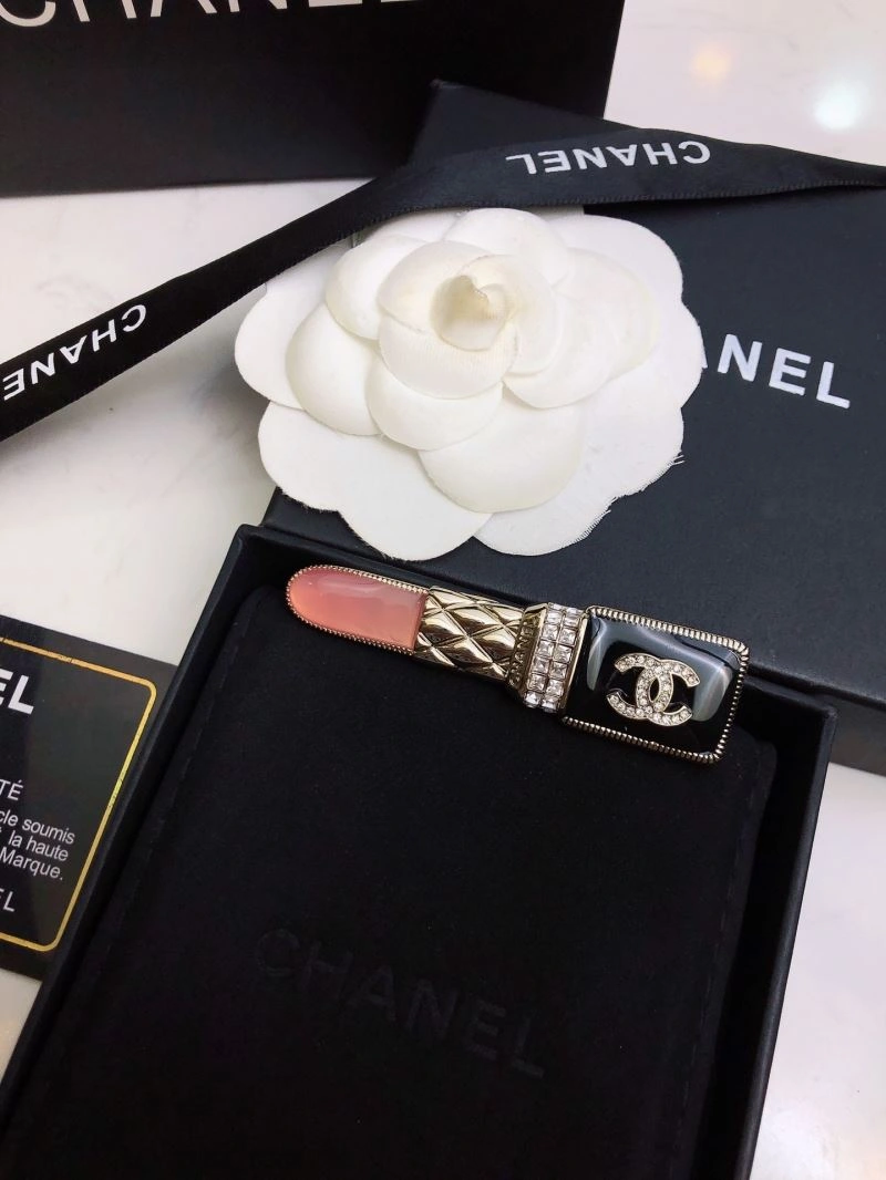 Indistinguishable Chanel Brooches