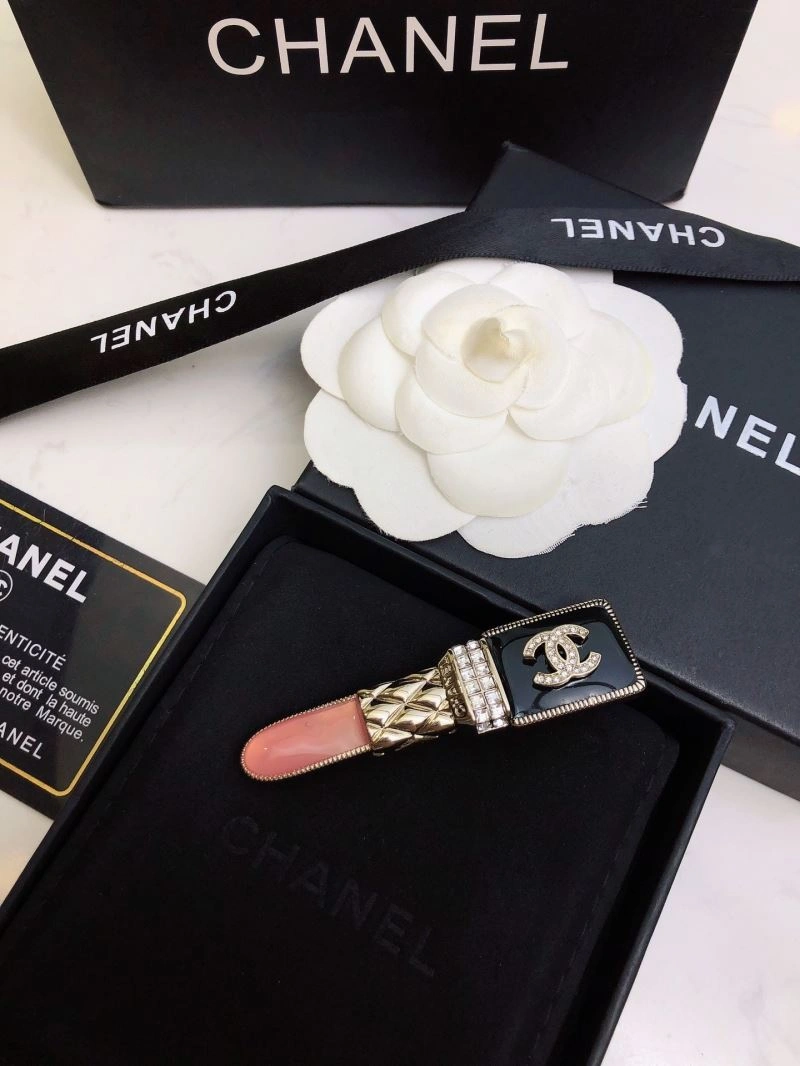 Indistinguishable Chanel Brooches