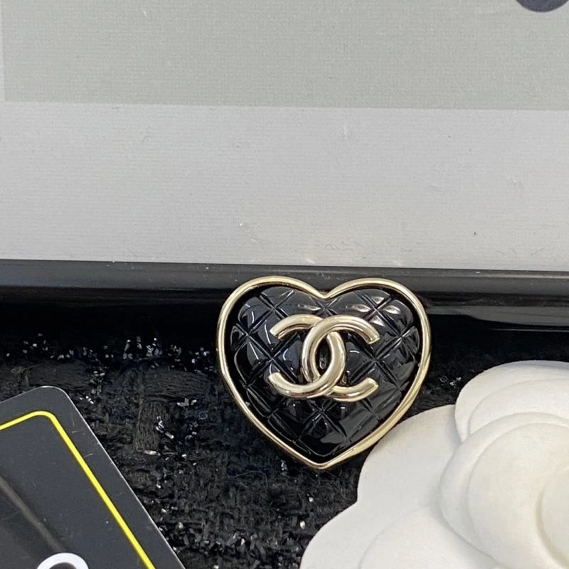 Indistinguishable Chanel Brooches