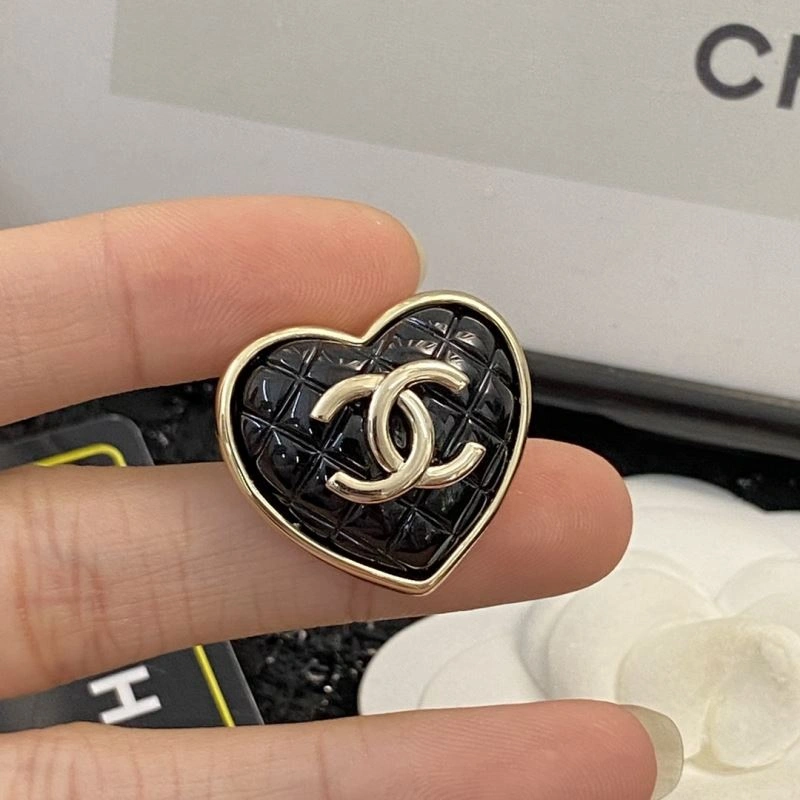 Indistinguishable Chanel Brooches