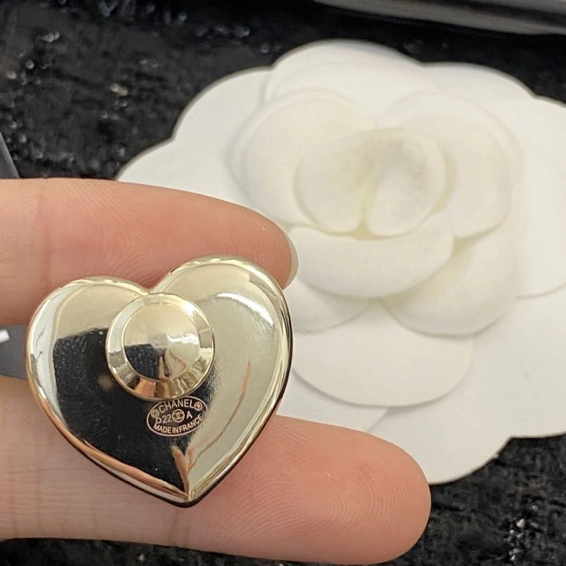 Indistinguishable Chanel Brooches