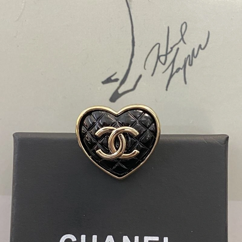 Indistinguishable Chanel Brooches
