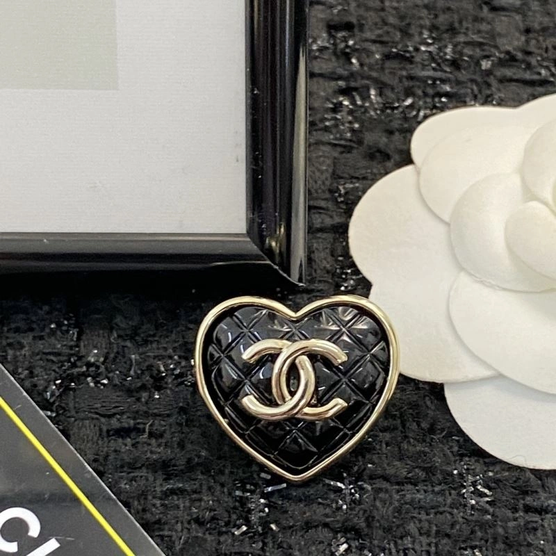 Indistinguishable Chanel Brooches