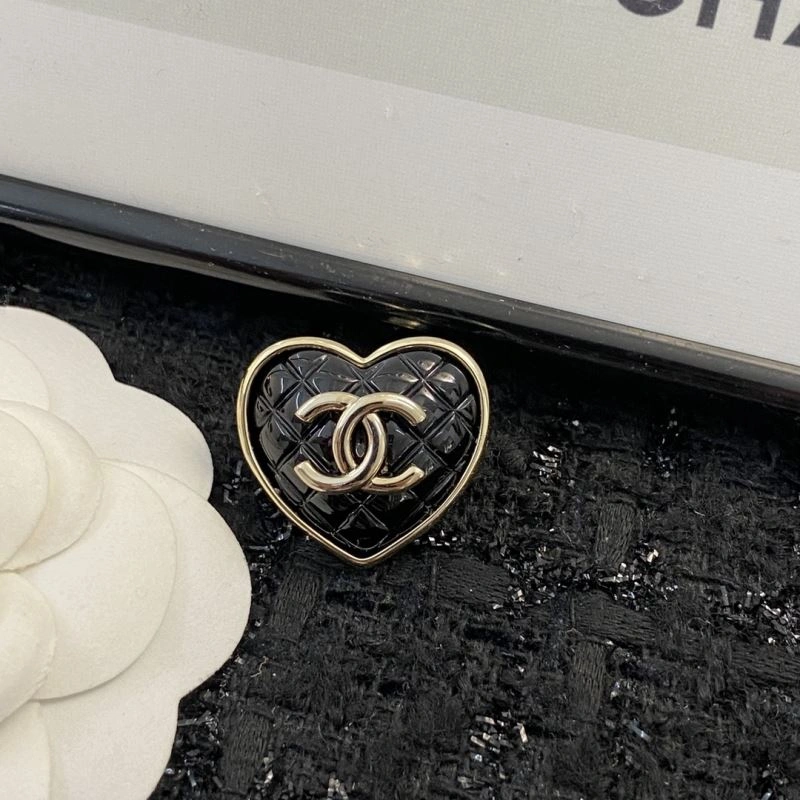 Indistinguishable Chanel Brooches