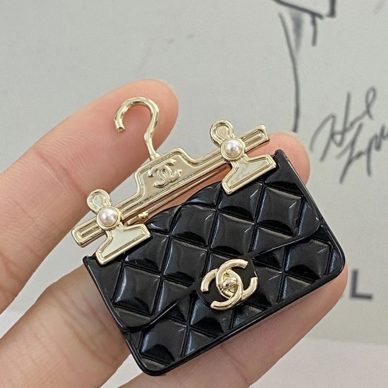 Top match Chanel Brooches