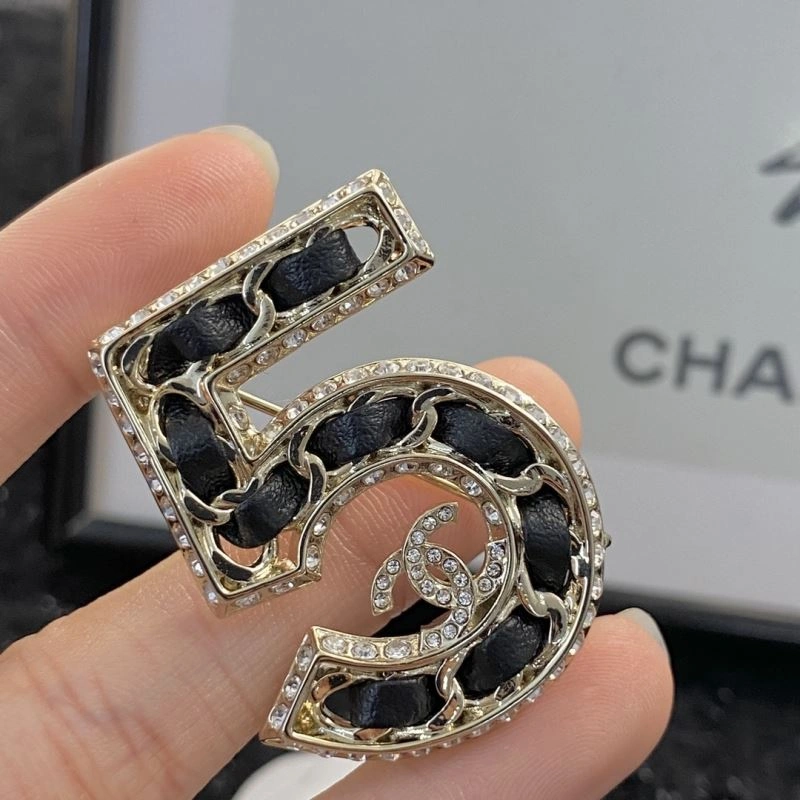 Cut-rate Chanel Brooches