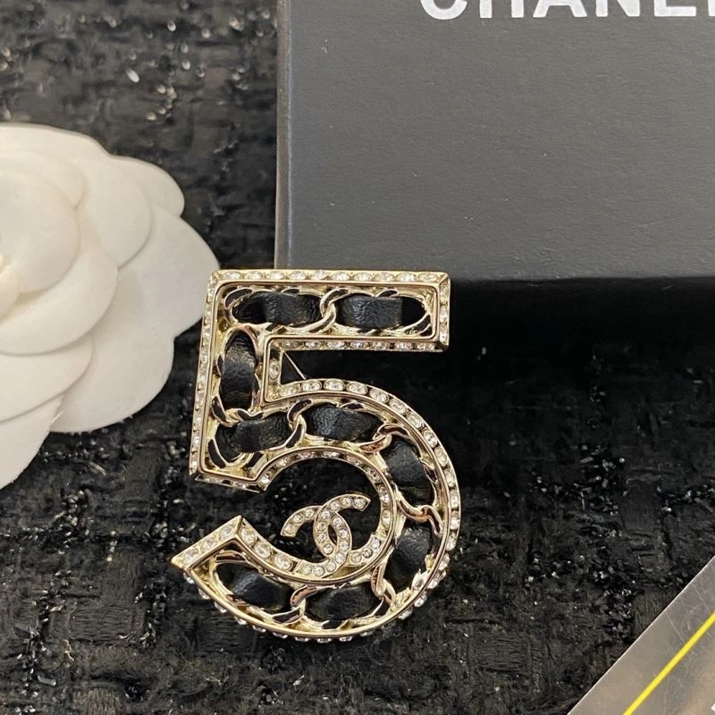 Cut-rate Chanel Brooches