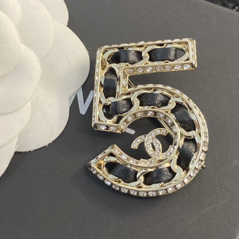 Cut-rate Chanel Brooches