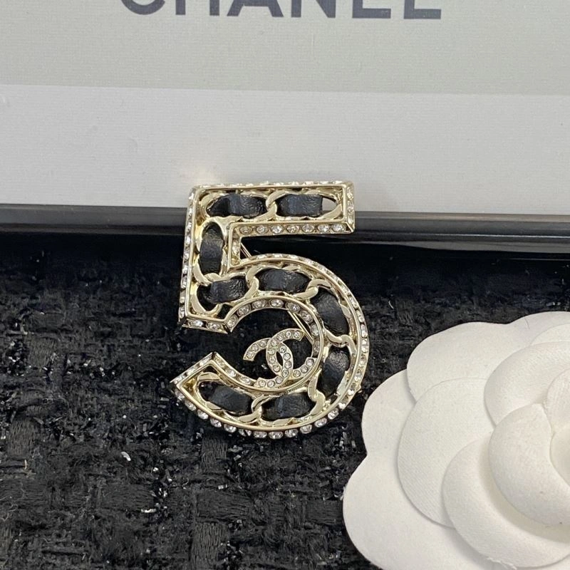 Cut-rate Chanel Brooches