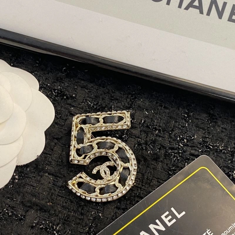 Cut-rate Chanel Brooches