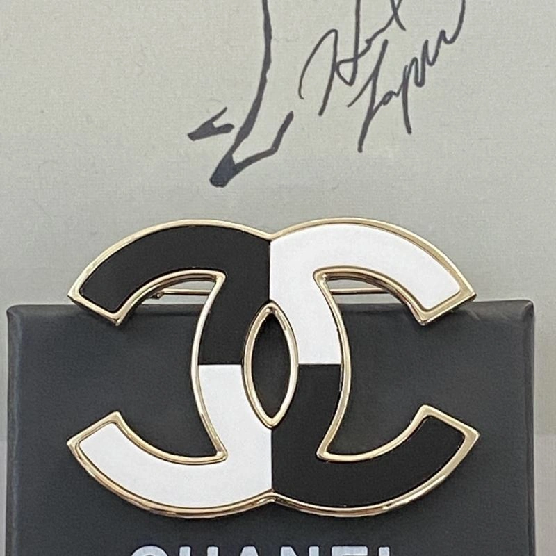 Cut-rate Chanel Brooches