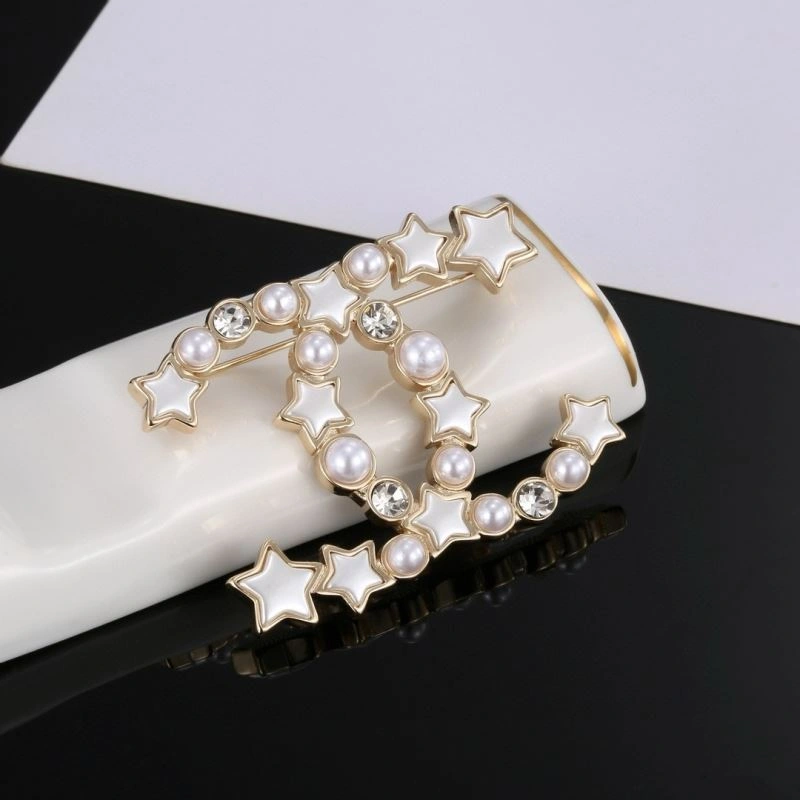 Reasonably priced Chanel Brooches