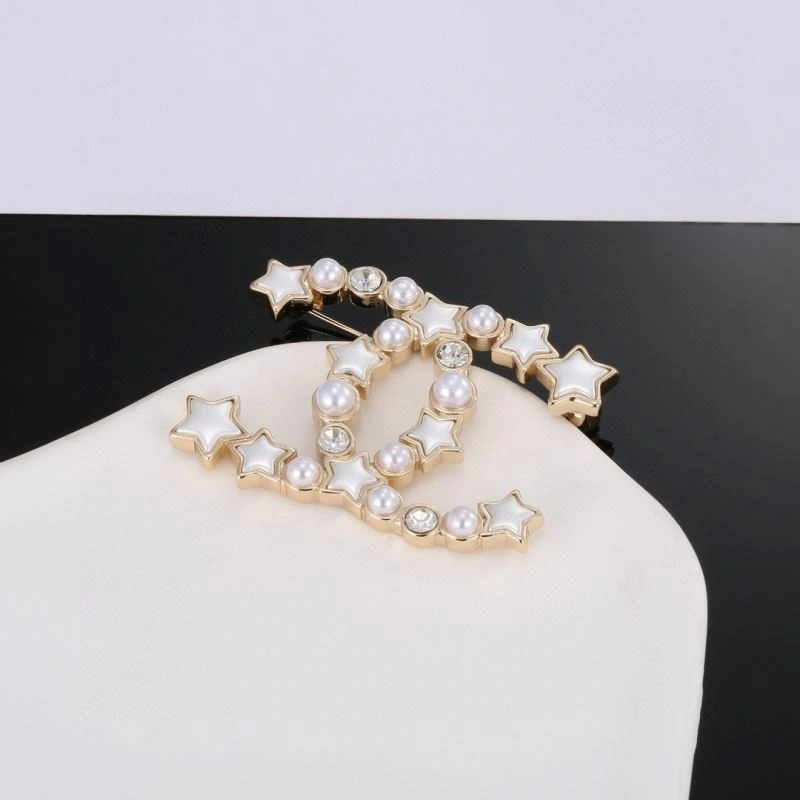 Reasonably priced Chanel Brooches