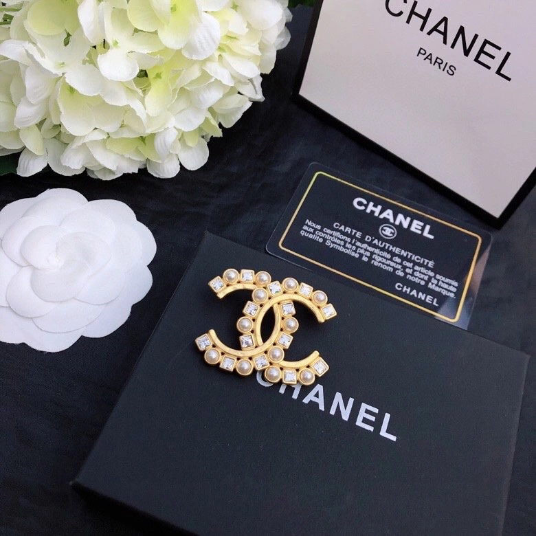 Reasonably priced Chanel Brooches