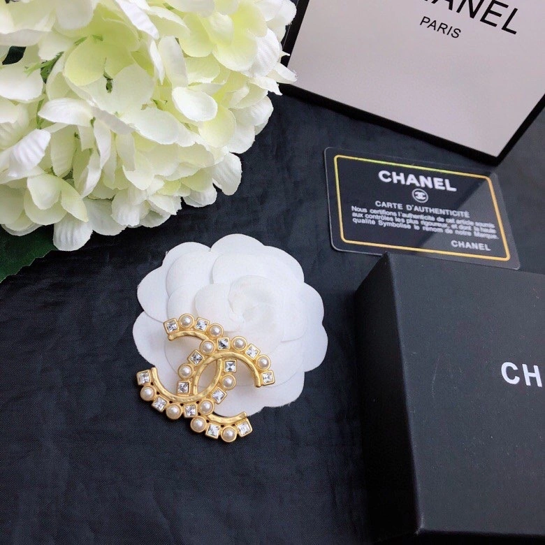 Reasonably priced Chanel Brooches
