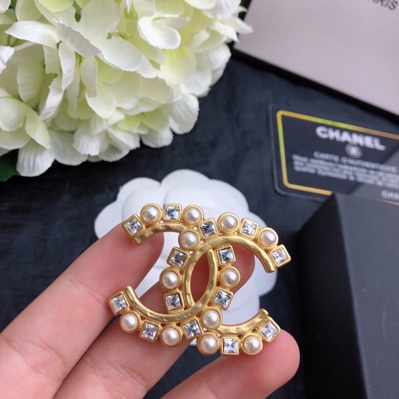 Reasonably priced Chanel Brooches