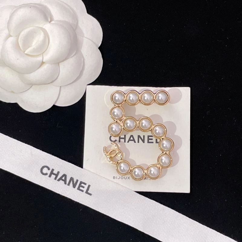 Indistinguishable Chanel Brooches