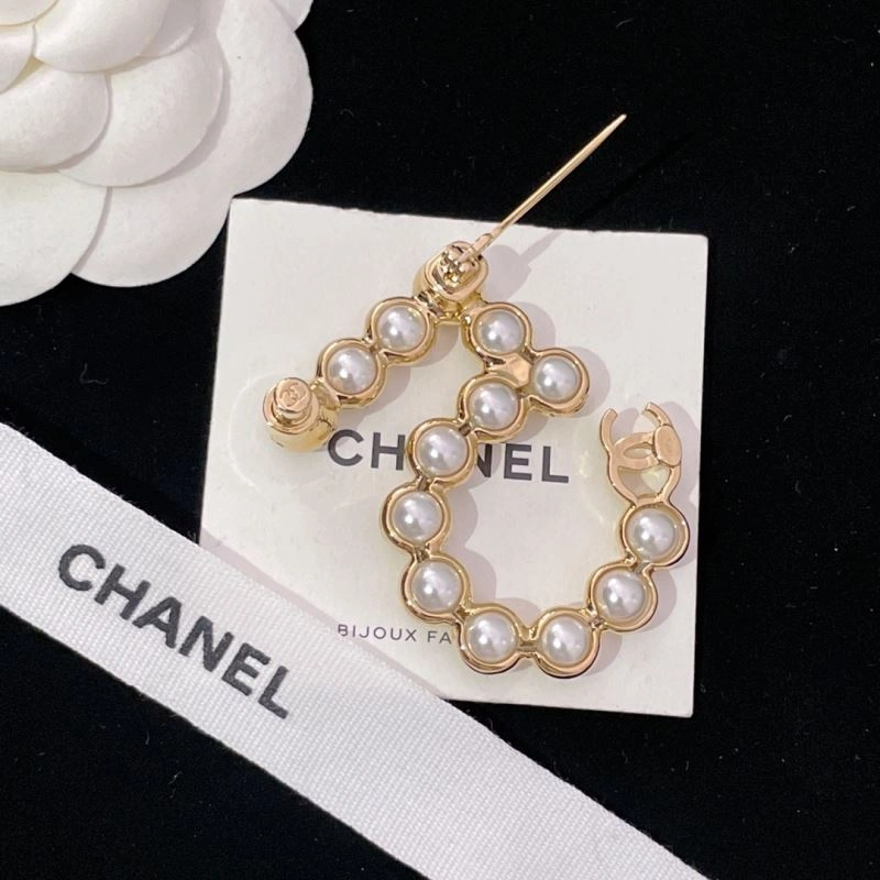 Indistinguishable Chanel Brooches