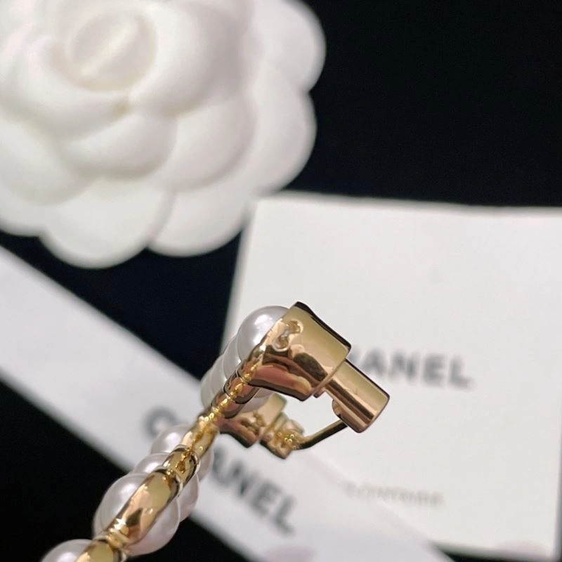 Indistinguishable Chanel Brooches