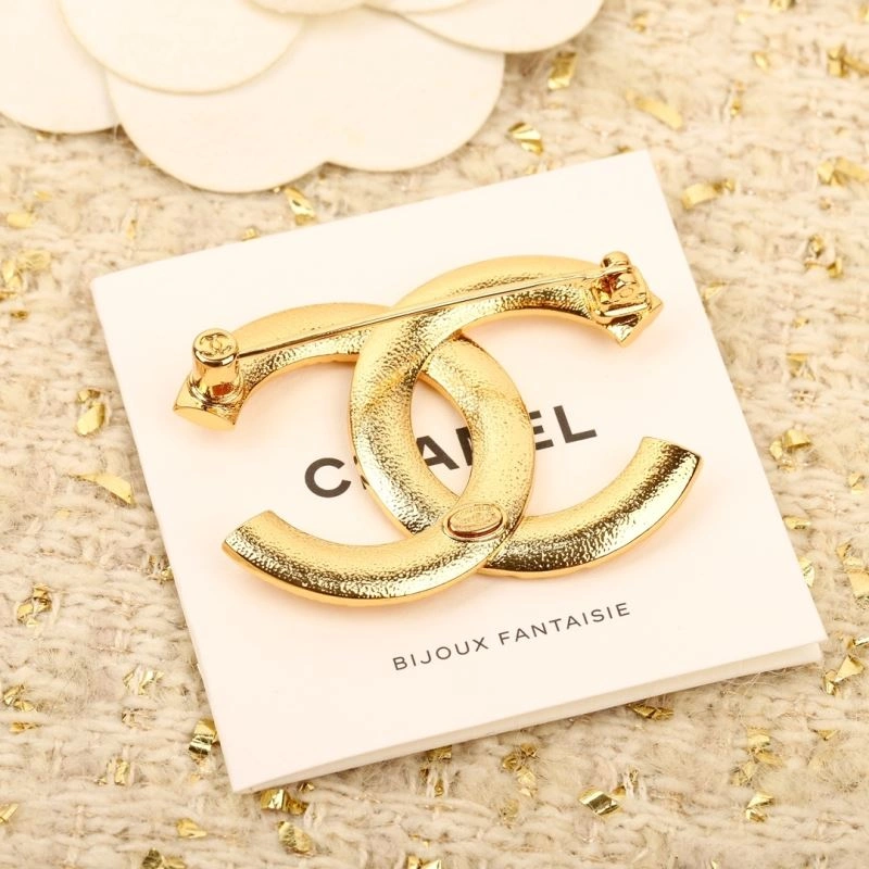 Cut-rate Chanel Brooches
