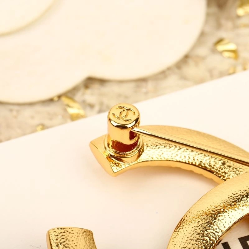 Cut-rate Chanel Brooches