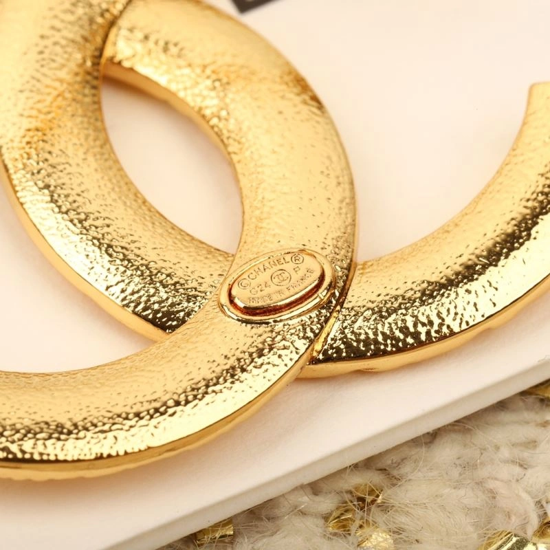 Cut-rate Chanel Brooches