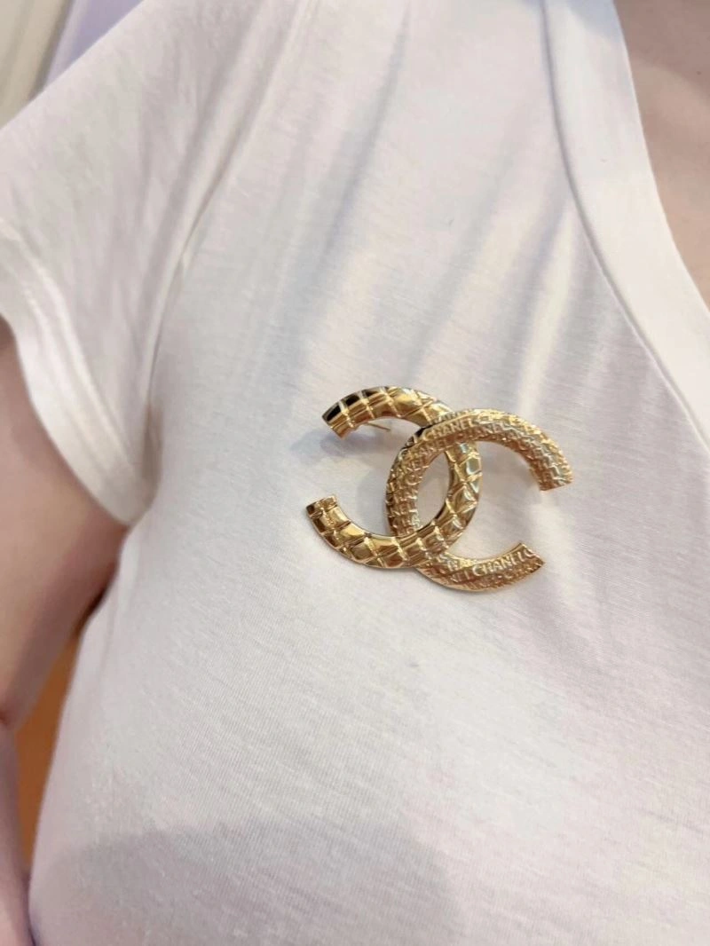 Cut-rate Chanel Brooches