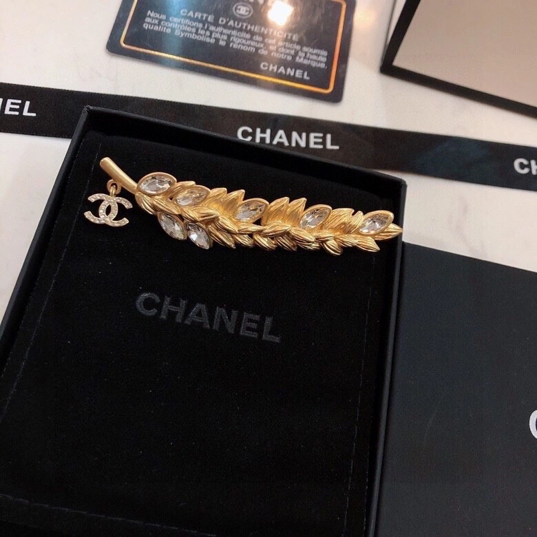 Reasonably priced Chanel Brooches