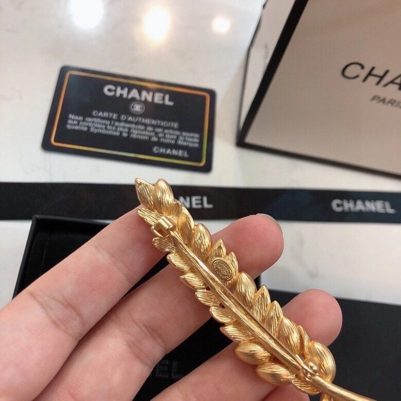 Reasonably priced Chanel Brooches