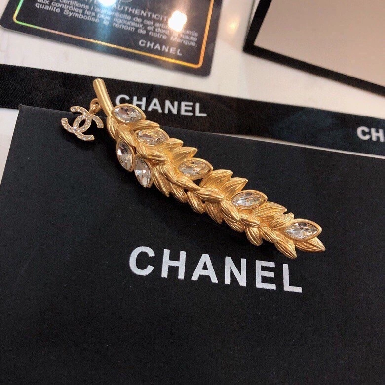 Reasonably priced Chanel Brooches