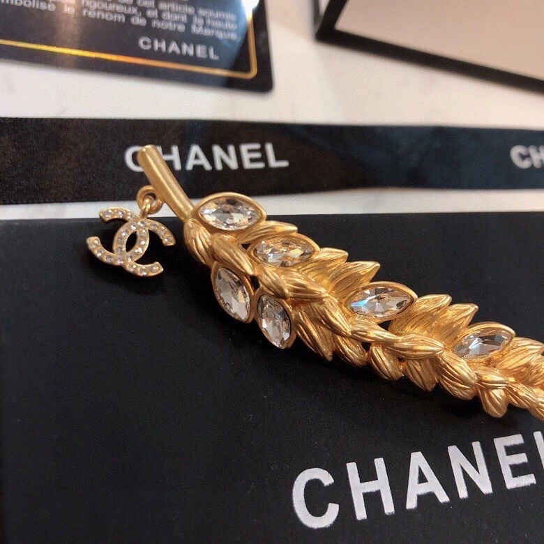Reasonably priced Chanel Brooches