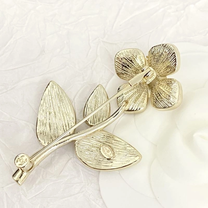 Cut-rate Chanel Brooches