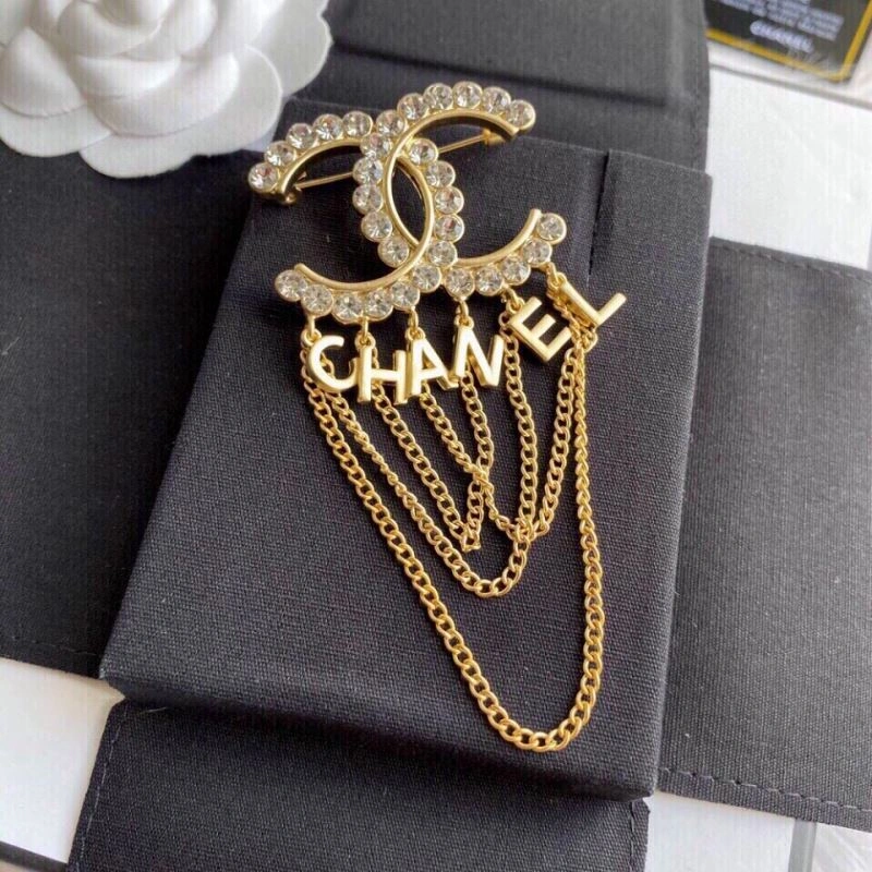 Indistinguishable Chanel Brooches