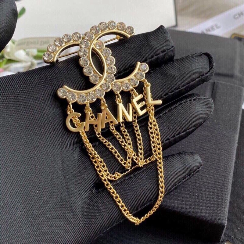 Indistinguishable Chanel Brooches