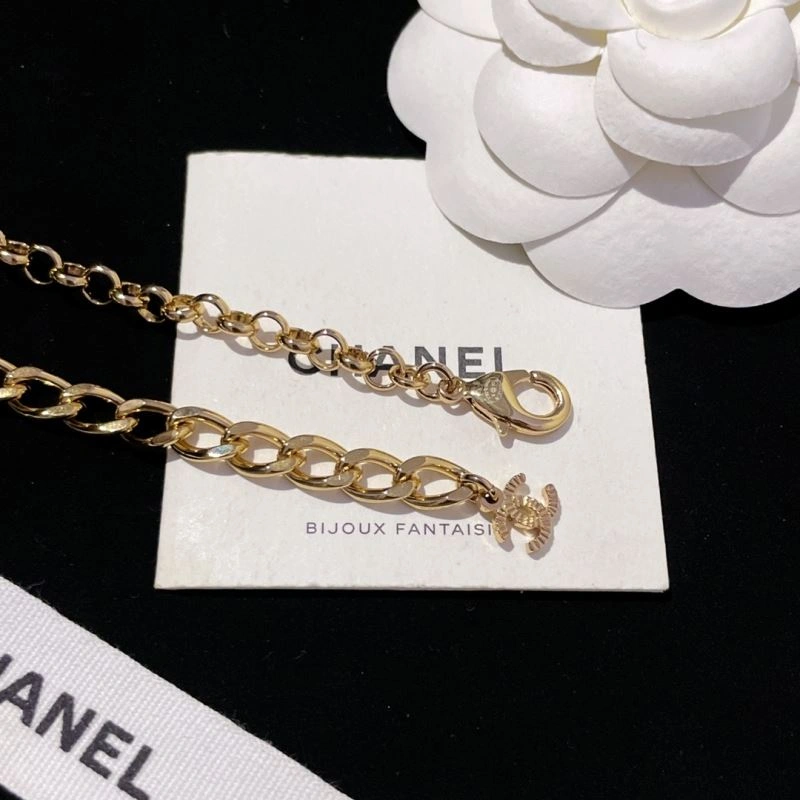 Indistinguishable Chanel Brooches