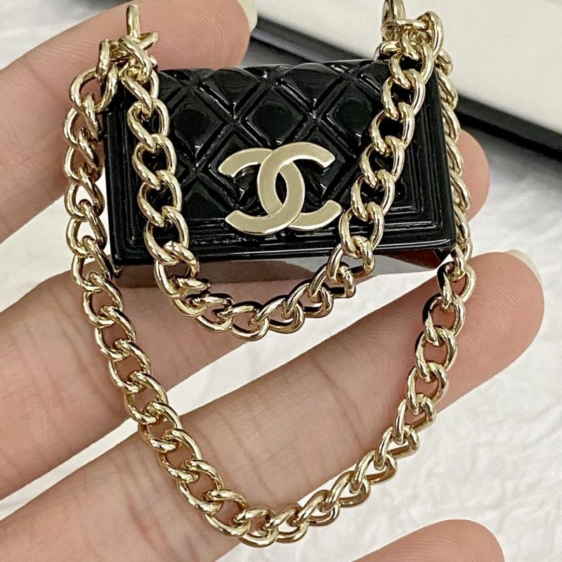 Cut-rate Chanel Brooches