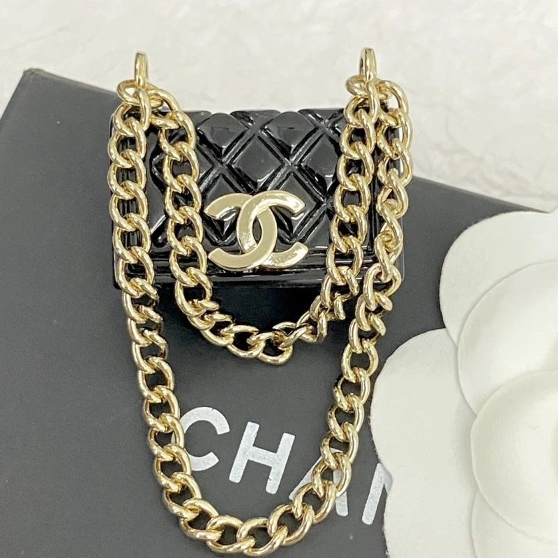 Cut-rate Chanel Brooches
