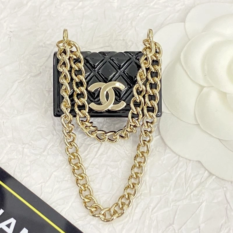 Cut-rate Chanel Brooches