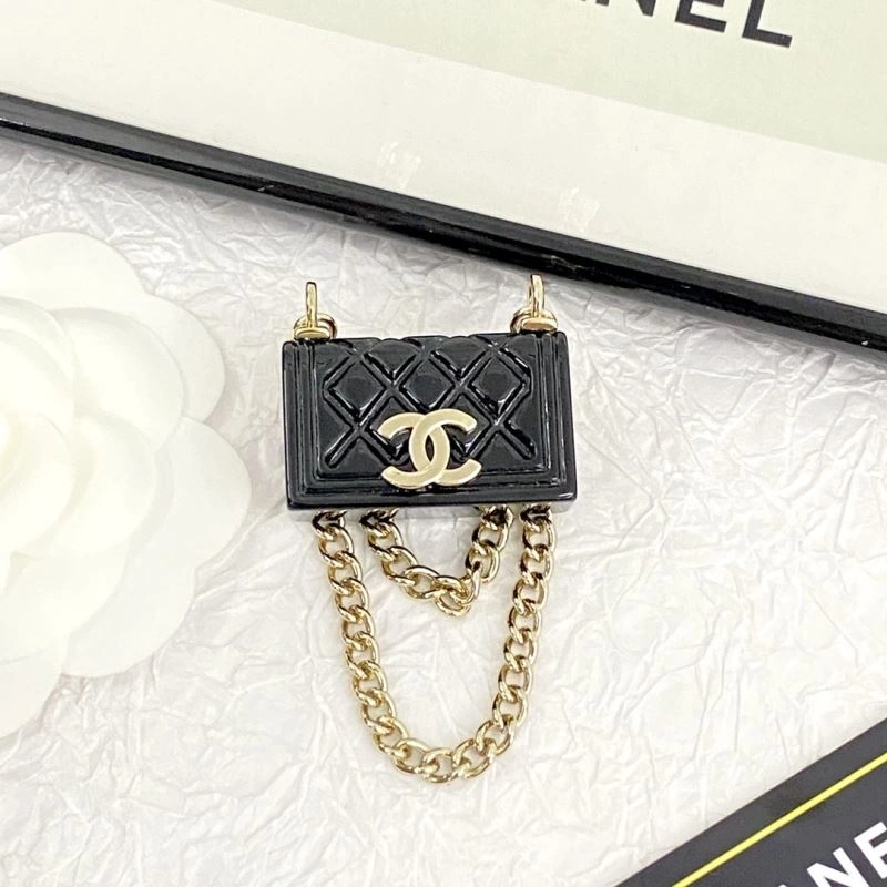 Cut-rate Chanel Brooches