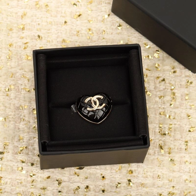 Indistinguishable Chanel Brooches