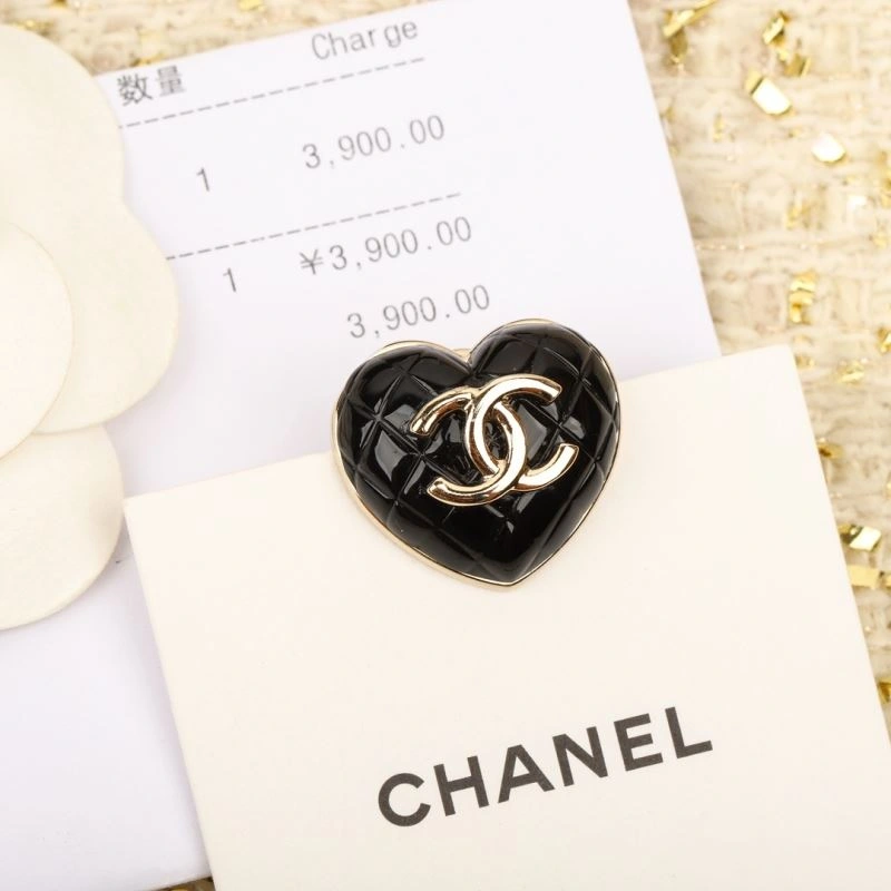Indistinguishable Chanel Brooches