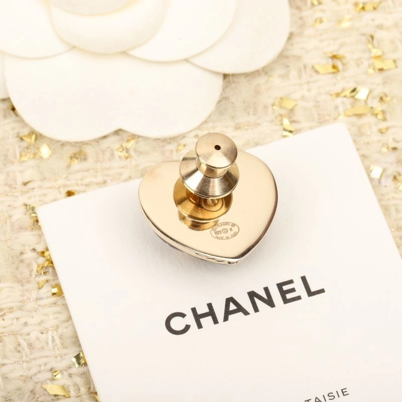 Indistinguishable Chanel Brooches