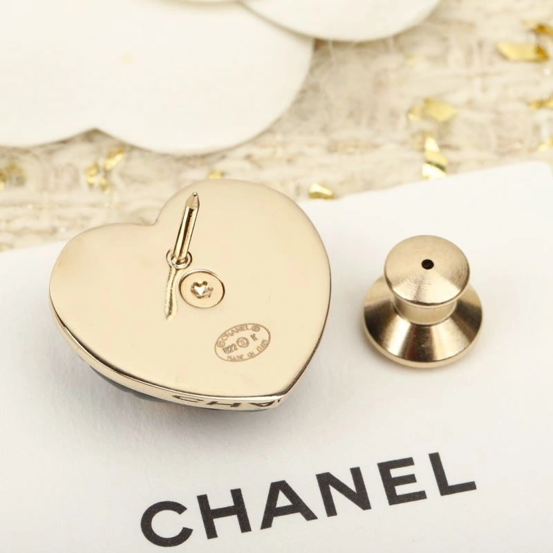 Indistinguishable Chanel Brooches