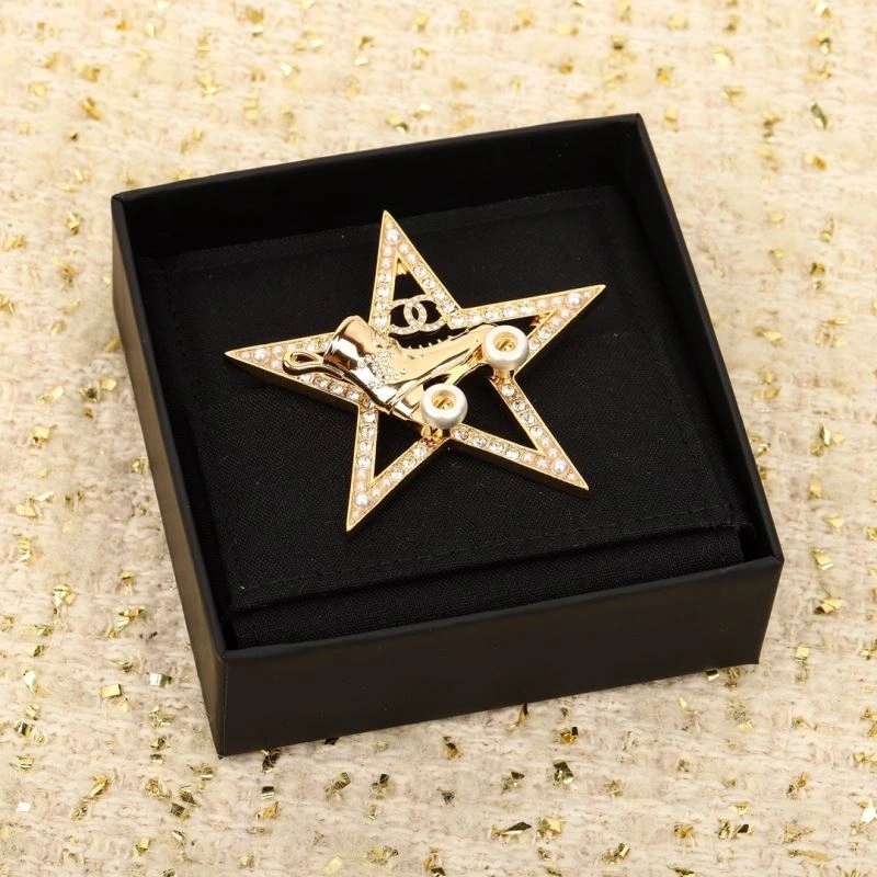 Cut-rate Chanel Brooches